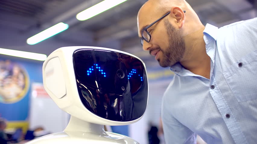 Visitors Man Talking with Humanoid Stock Footage Video (100% Royalty ...