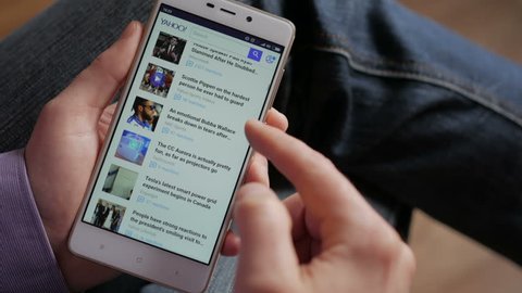 Man Using His Smartphone Scroll Official Stock Footage Video (100% Royalty-free) 1008015499 ...