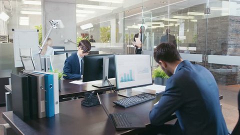 big office associate brings important news Stock Footage Video (100% ...