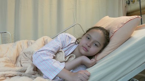 Little Girl Lying On Couch Playing Stock Footage Video (100% Royalty ...