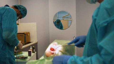Two Surgeons Blue Robes Make Operation Stock Footage Video (100% ...