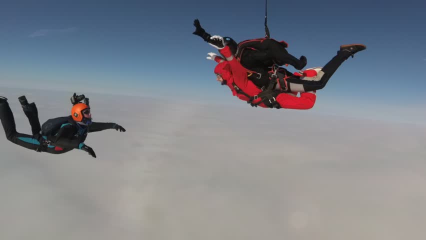 Skydiving. Cameraman is Making Film Stock Footage Video (100% Royalty ...