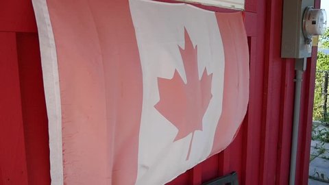 Canadian Flag Hanging On Wall Porch Stock Footage Video (100% Royalty ...