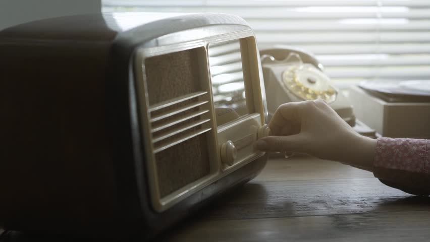 woman tuning vintage radio searching station Stock Footage Video (100% ...