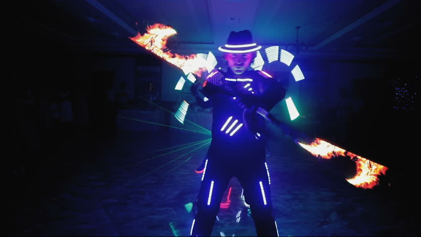 man dancing laser show entertains viewers Stock Footage Video (100% ...
