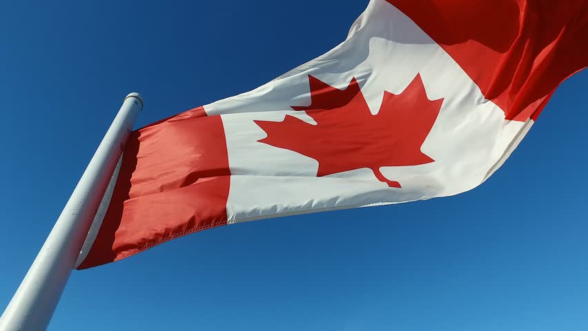 close-up canadian flag flapping front parliament Stock Footage Video ...