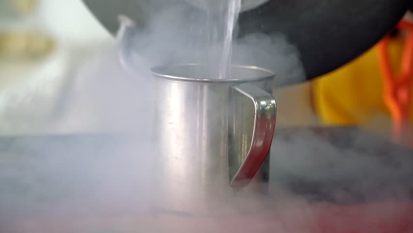 liquid nitrogen heavy poured into iron Stock Footage Video (100% ...
