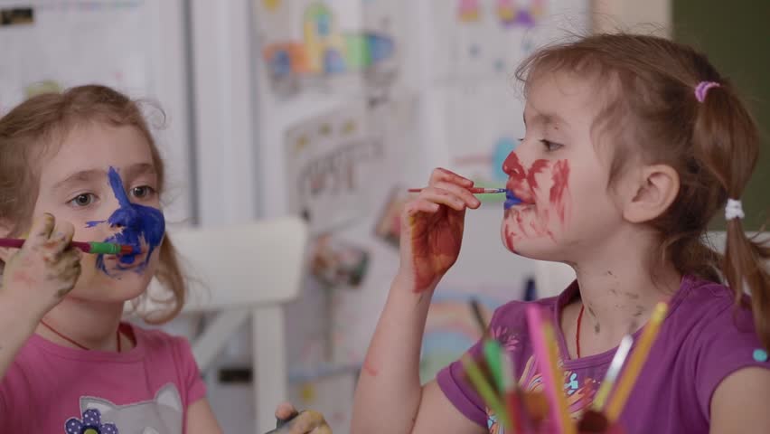 two girls paint each other's colors Stock Footage Video (100% Royalty ...