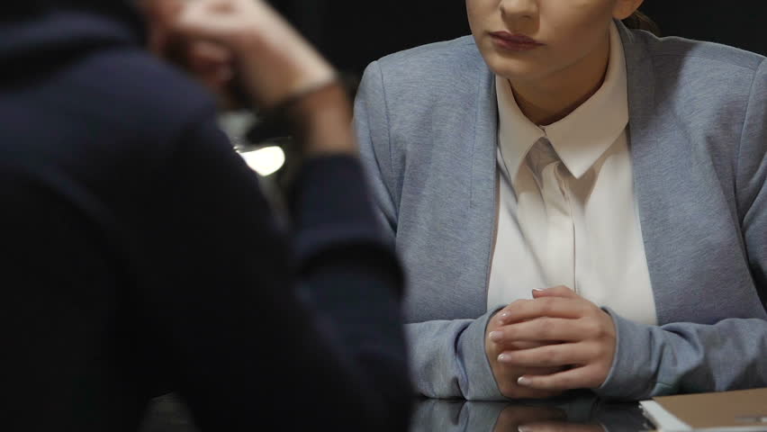 woman investigator conducting interrogation suspect crime Stock Footage ...