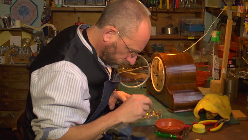 clockmaker steve fletcher collecting tools together Stock Footage Video ...