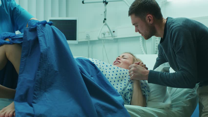 emergency hospital woman giving birth husband Stock Footage Video (100% ...