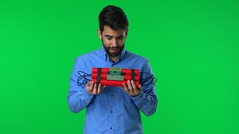 Man Holding Dynamite Over Green Screen Stock Footage Video (100% ...