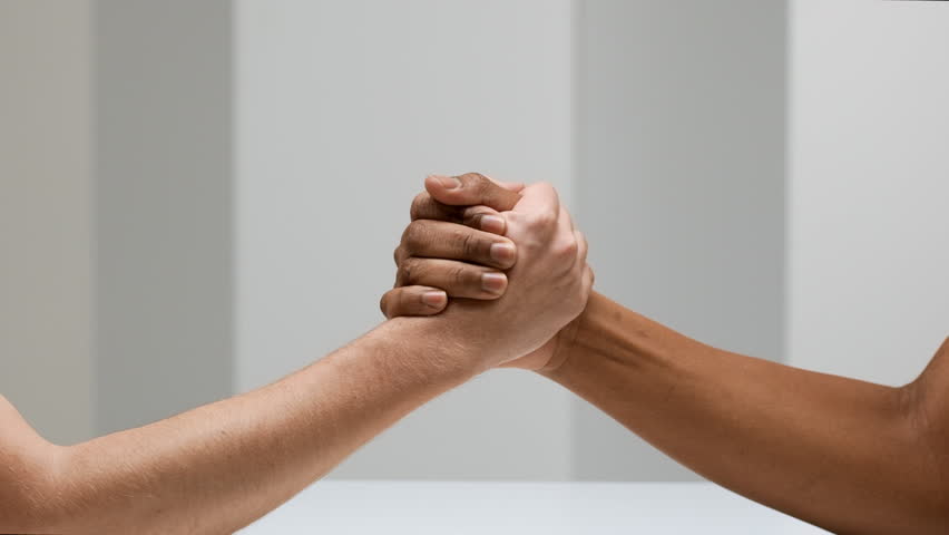 two hands joining together doing arm Stock Footage Video (100% Royalty ...