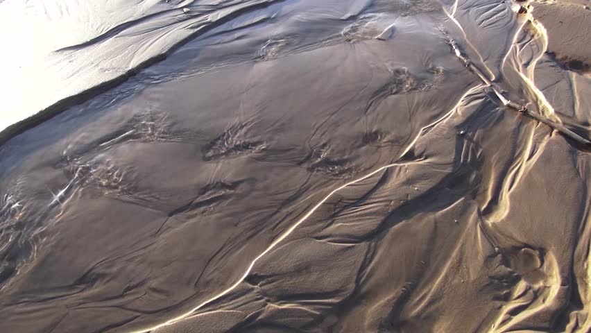 water flows through sand leaving beautiful Stock Footage Video (100% ...