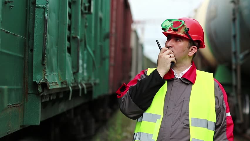 railroader portable radio transmitter near goods Stock Footage Video ...