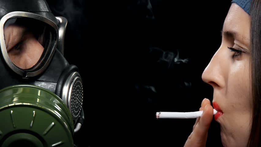 young man gas mask protect cigarette Stock Footage Video (100% Royalty ...