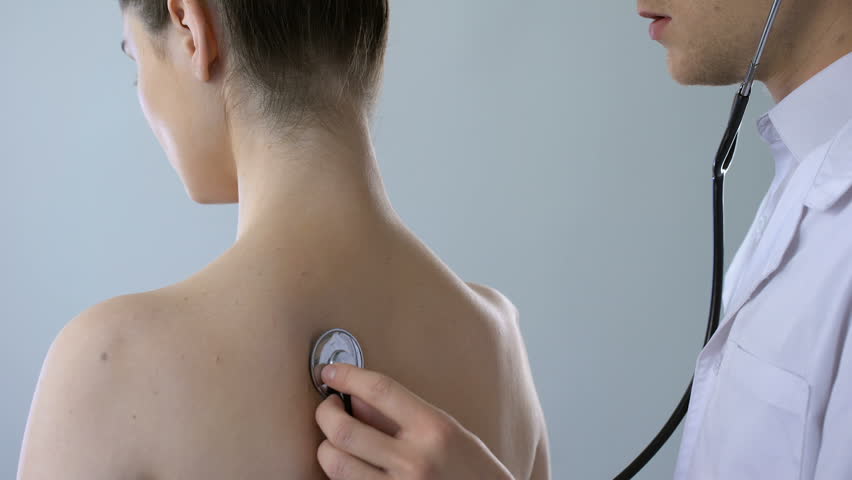 physician listening lungs stethoscope woman breathing Stock Footage ...