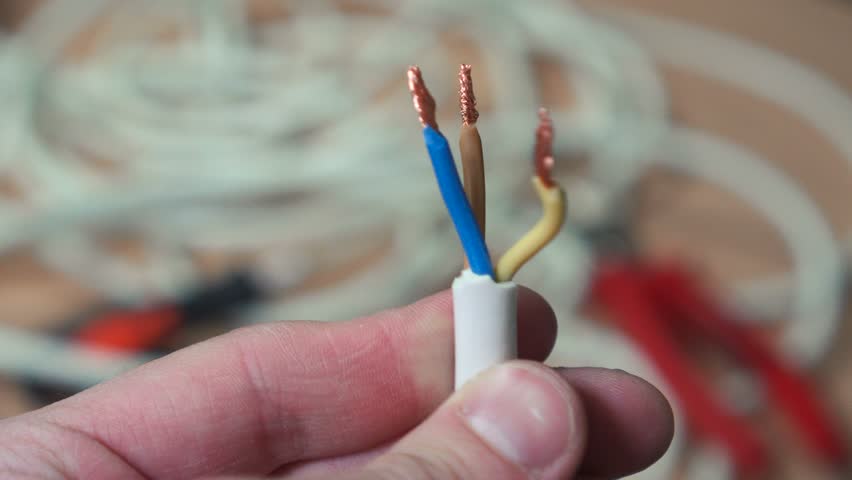 man's hand holds copper wires Stock Footage Video (100% Royalty-free ...