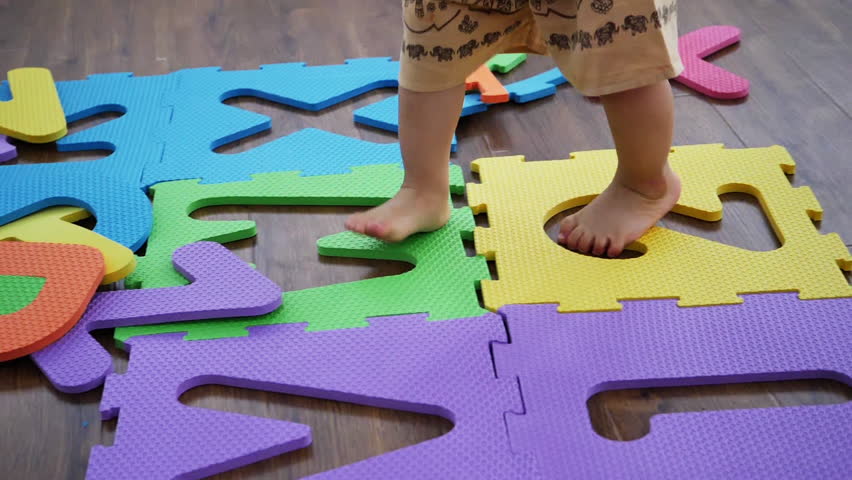 Colorful Floor Puzzle Mats for Stock-video (100 % royaltyfri ...