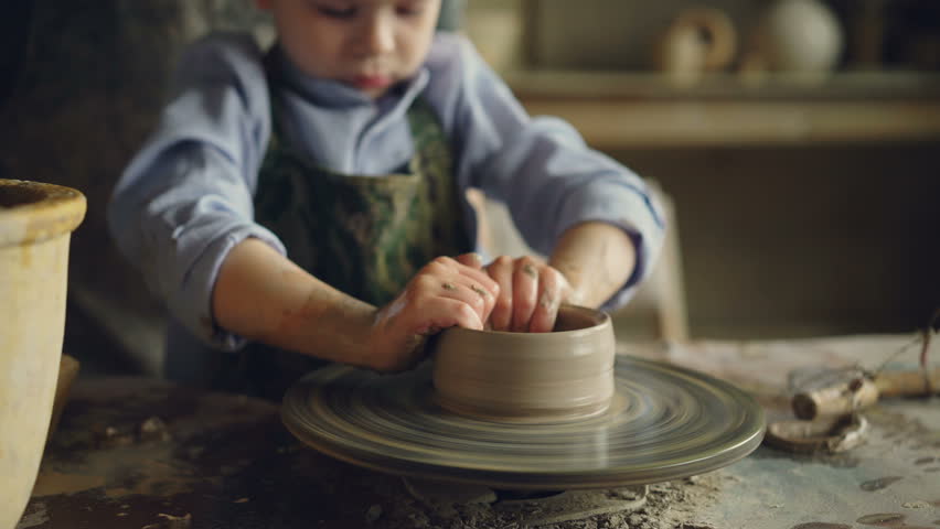 Serious Boy is Forming Pot Stock Footage Video (100% Royalty-free ...