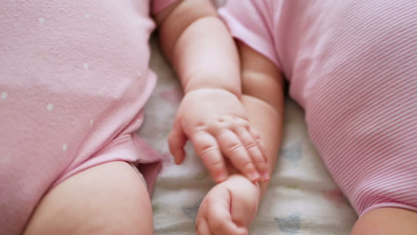 Two Girls Twins Hold Hands Stock Footage Video (100% Royalty-free ...