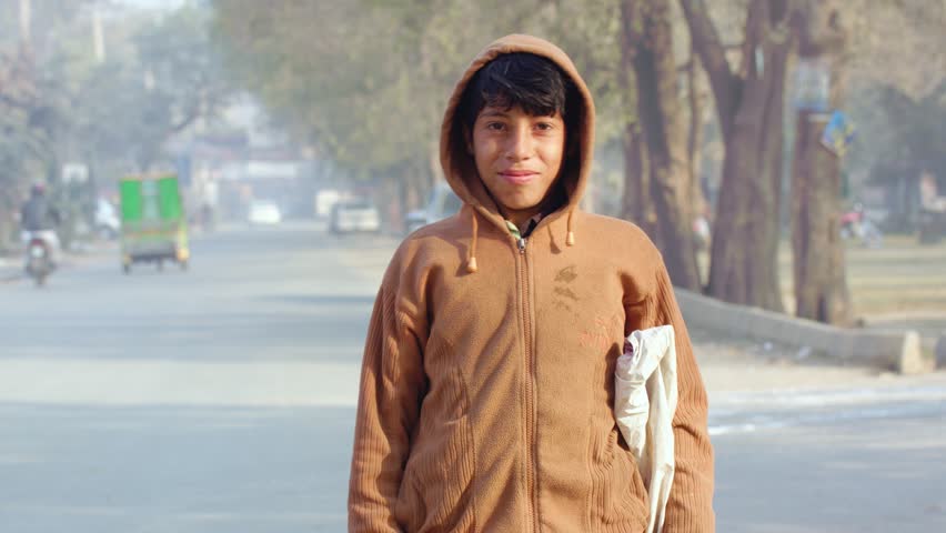 poor boy garbage collector looks camera Stock Footage Video (100% ...