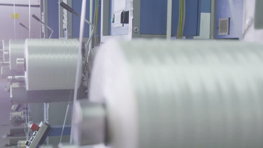 macro bobbins rotate winding fiberglass light Stock Footage Video (100% ...