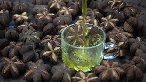 Pouring Sacha Inchi Tea Slow Motion Stock Footage Video (100% Royalty ...