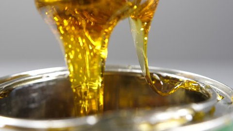 4k Pouring Spoon Golden Syrup Into Stock Footage Video (100% Royalty ...