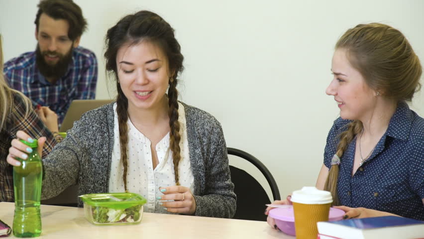 People eating dining hall Stock Video Footage - 4K and HD Video Clips ...