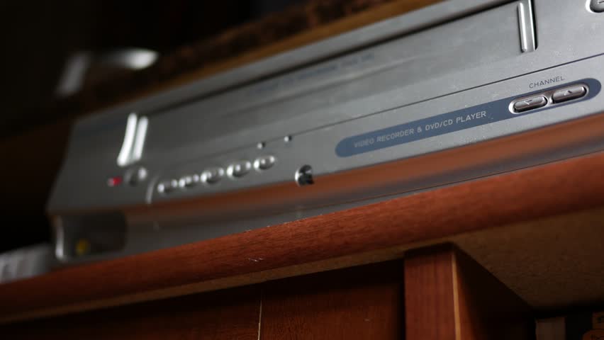 inserting vhs tape into player - Stock Footage Video (100% Royalty-free ...