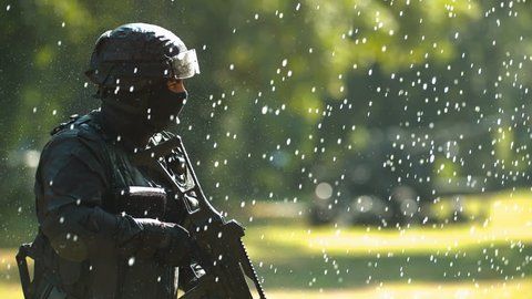 Military Man Raising Weapon Rain Slow Stock Footage Video (100% Royalty ...