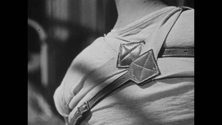 1940s man wearing prosthetic arm rig Stock Footage Video (100% Royalty ...