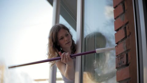 Attractive Girl Washes Windows Home Clean Stock Footage Video (100% ...
