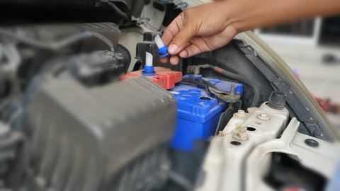 Man Refill Acid Water Car Battery Stock Footage Video (100% Royalty ...