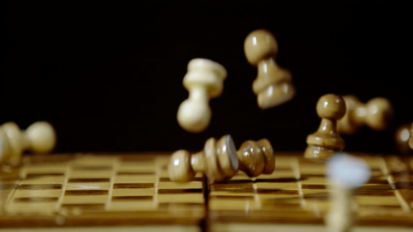 close chess pieces falling on board Stock Footage Video (100% Royalty ...