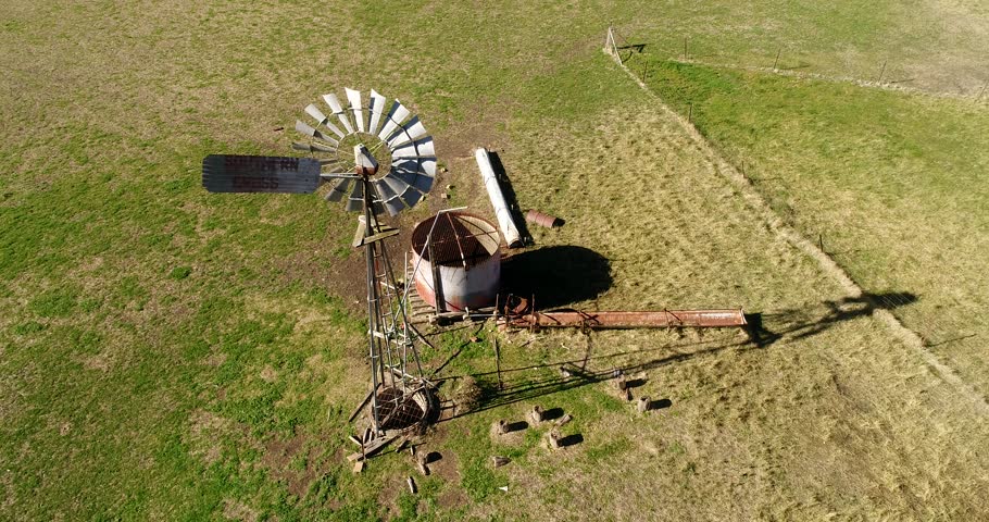 above looking down spinning windmill middle Stock Footage Video (100% ...