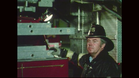 1970s Firefighter Stands By Truck Looks Stock Footage Video (100% ...