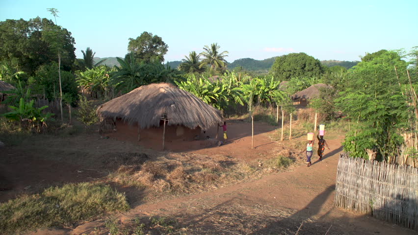 two rural african women walk through Stock Footage Video (100% Royalty ...