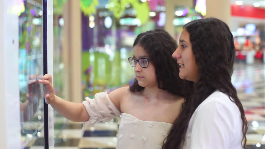 two girls use interactive panel mall Stock Footage Video (100% Royalty ...