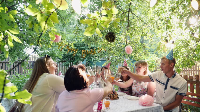 Family Celebration or a Garden Stock Footage Video (100% Royalty-free ...