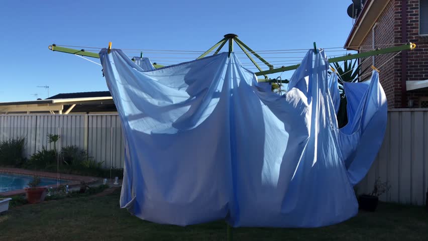 Blue Sheets On a Rotary Stock Footage Video (100% Royalty-free ...