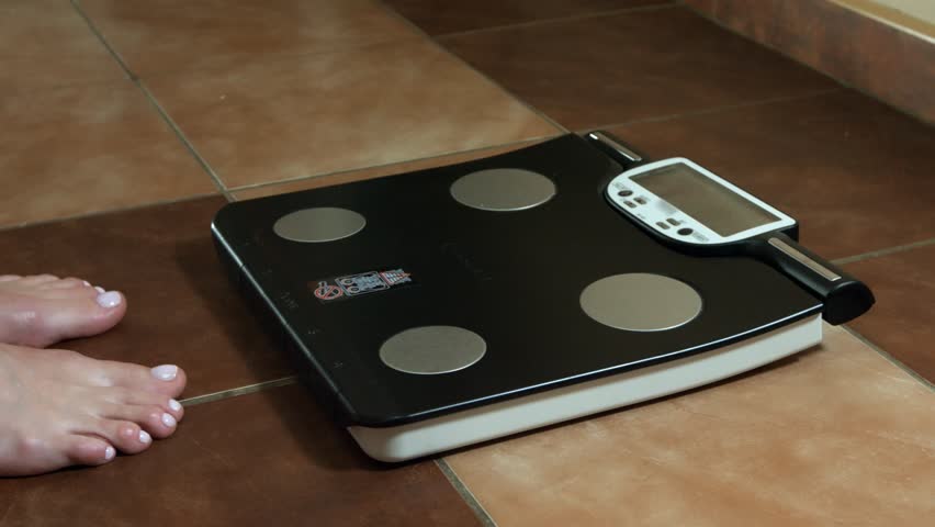 Women Step On Digital Scales Stock Footage Video (100% Royalty-free ...