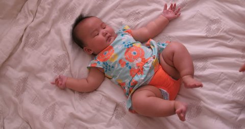 Asian Mother Tickling Her Baby Girl Stock Footage Video (100% Royalty ...