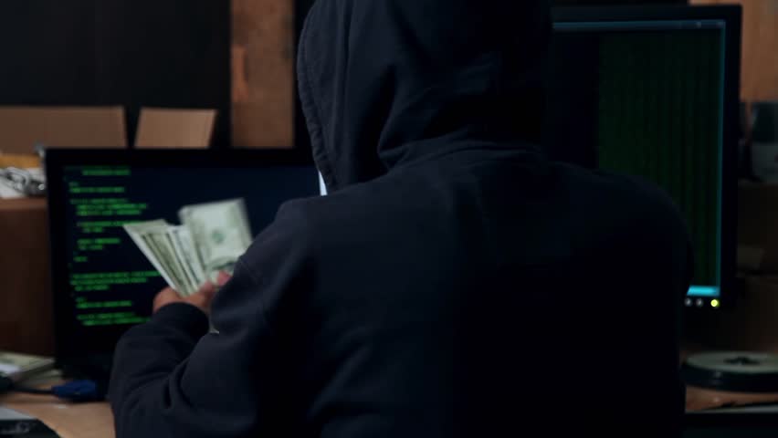 hacker counting cash starts hacking Stock Footage Video (100% Royalty ...