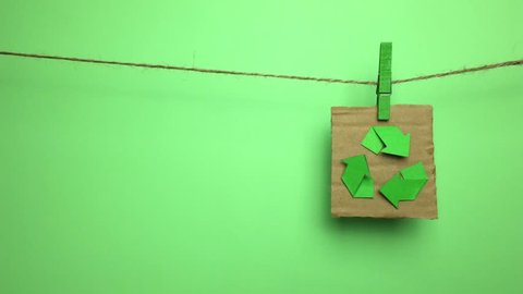 Recycle Symbol On String On Green Stock Footage Video (100% Royalty ...