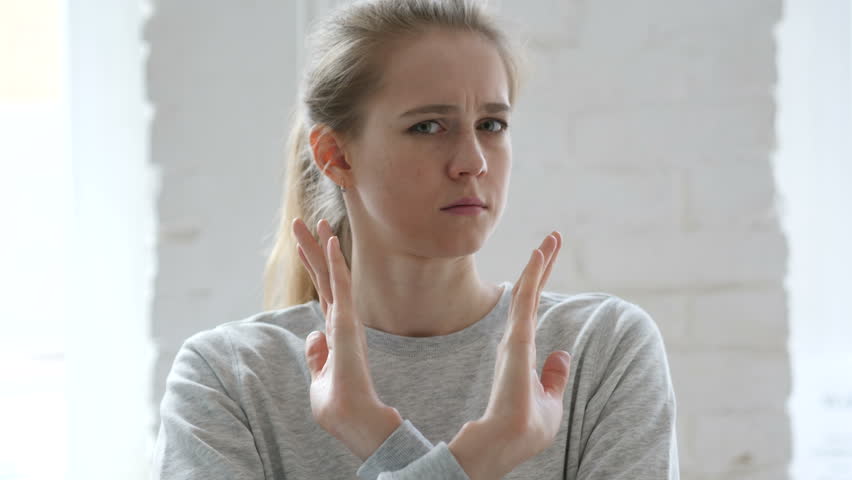 rejecting disliking gesture by young woman Stock Footage Video (100% ...