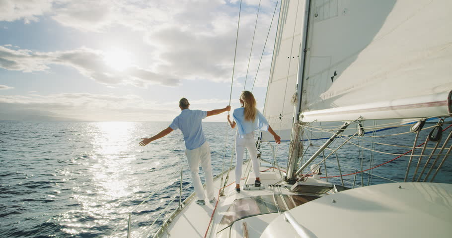 romantic couple sailing into sunset Stock Footage Video (100% Royalty ...