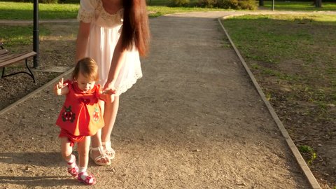 Mom Catches Little Baby Who Learns Stock Footage Video (100% Royalty ...