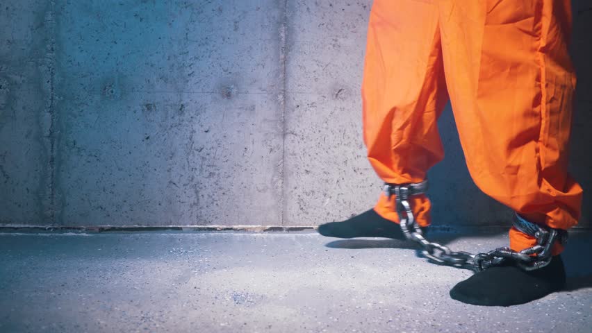 prison inmate chains around his legs Stock Footage Video (100% Royalty ...